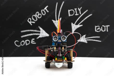 Hand Made Robot Working On The Arduino Platform White Background Free Space For Text STEM