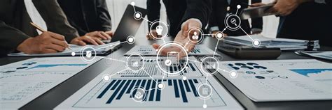 Business Team Collaborating On Data Analysis With Charts And Graphs Focused On Strategy And