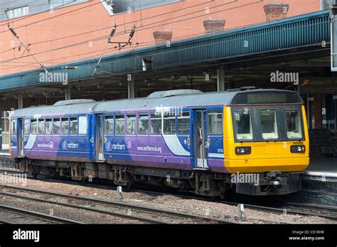 Class 142 Train In Northern Rail Livery Waiting At A Railway Station In