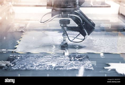 Modern Cnc Abrasive Water Jet Cutting Machine Using High Pressure Water