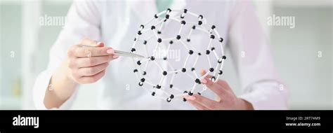 Woman Scientist Shows Model Of Molecular Structure In Her Hands