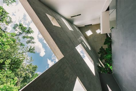 Angular Concrete Shell Encloses Interior Gardens At The Window House Angular Concrete Shell Encloses Interior Gardens At The Window House