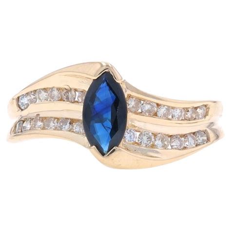 Yellow Gold Sapphire And Diamond Bypass Ring 14k Marquise 66ctw For