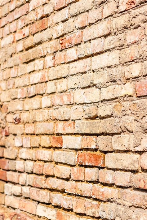Premium Photo Wall Of Yellow And Red Old Bricks Texture Background