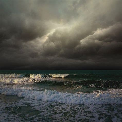Storm Clouds Over The Ocean With Crashing Waves