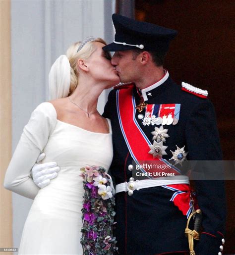 Norwegian Crown Prince Haakon And Mette Marit Tjessem Hoiby Kiss At