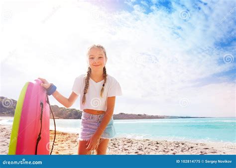 Girl On Sandy Sunny Beach Bending Over Camera Stock Image Image Of