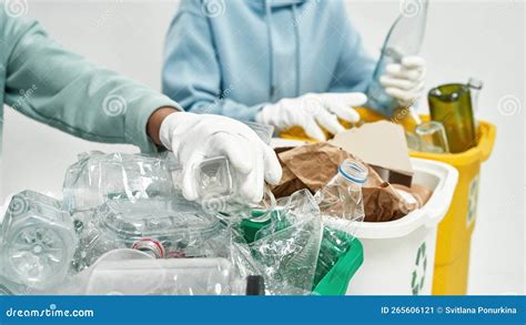 Couple Sort Garbage In Glass Plastic Paper Bins Stock Image Image Of Danger Reuse 265606121