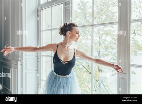 Young Classical Ballet Dancer Woman In Dance Class Beautiful Graceful