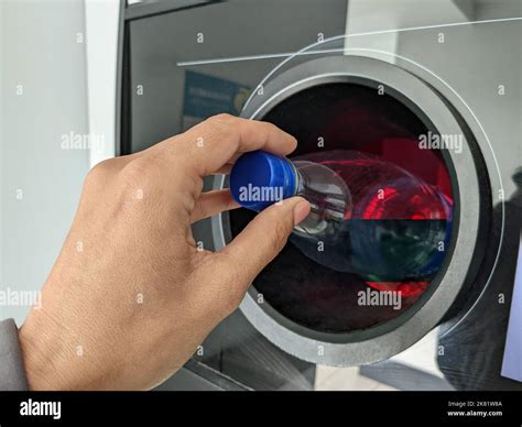 Reverse Vending Machine Woman Hand Put Empty Plastic Bottle In The