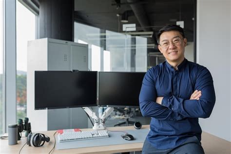 Premium Photo Portrait Of Successful Programmer In Modern Office Of