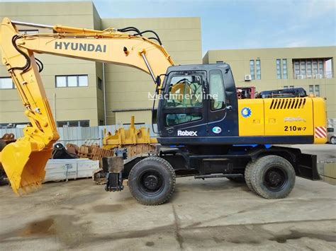 Hyundai R210w Wheel Excavator For Sale From China Shanghai Lm44485