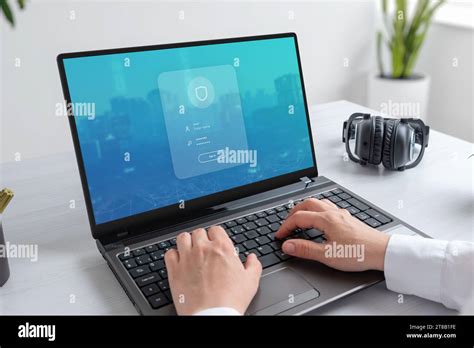 Laptop Displaying A Security Login Form With Username And Password