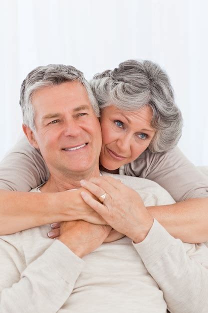 Premium Photo Mature Woman Hugging Her Husband