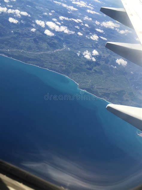 Passenger Plane Flying Over The Black Sea At The Border Of Ukraine