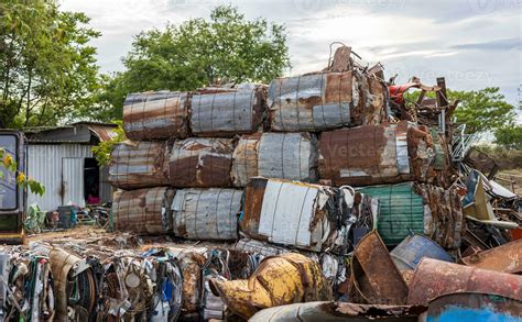 Views Of Piles Of Scrap Metal That Have Been Crushed And Compressed