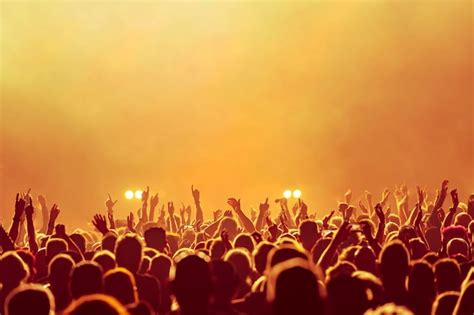 Premium Photo Crowd Of People Dancing At Concert