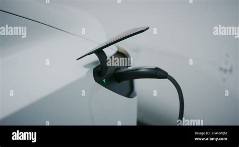 Tesla Model Charging Stock Videos Footage HD And K Video Clips Alamy