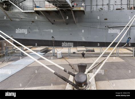Mooring Lines Of The Aircraft Carrier Intrepid Stretched Taut Over