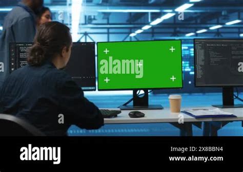 Software Developer Using Green Screen Pc To Do Programming In Server