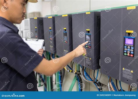 Inverter Control Room System Electrical Engineers Monitor The Controllers Frequency And Current