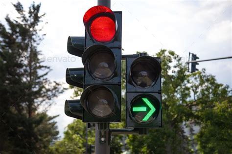 Closeup Of Red Traffic Light With Green Arrow Light Up Allow By Law To