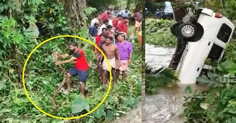 Suv And Python Rescued For A Flooded River In Kerala