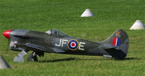 Realistic Rc Hawker Tempest Model Taxiing On Grass Airfield In Bright Daylight Editorial Stock