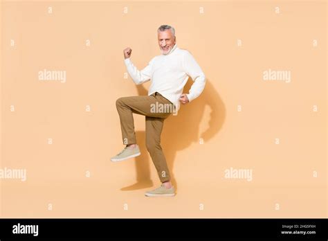 Full Length Body Size View Of Attractive Cheerful Grey Haired Man