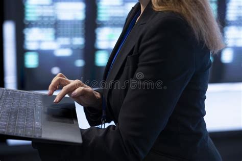 Computer Scientist In Server Hub Checking Parameters With Laptop Stock