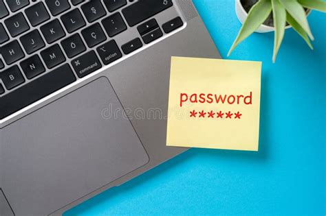 The Word Password Written On A Sticky Note Paper On Modern Laptop Stock