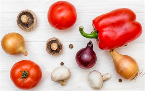 Premium Photo Different Vegetables On The White Wooden Table Top View