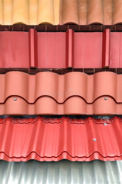Various Types Of Roof Coverings In The Window Of A Construction Store Stock Image Image Of