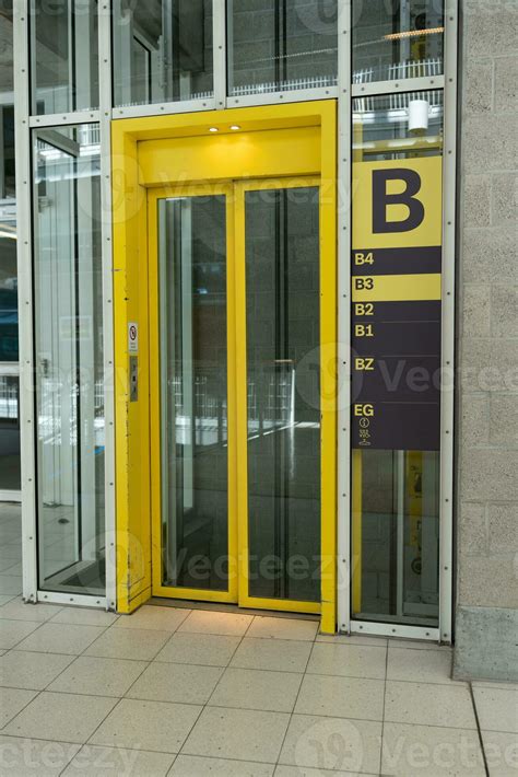 Yellow Elevator Car Glass Elevator Cabin In A Public Building Loft
