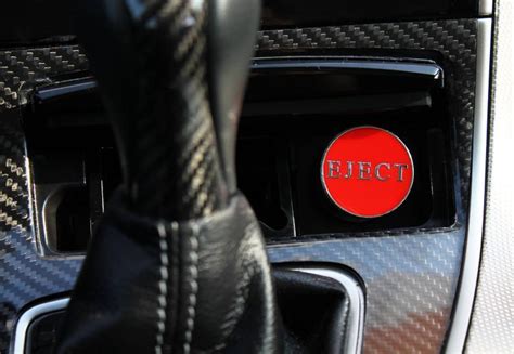 Fake Eject Button For Your Car Fits Into Your Cigarette Lighter