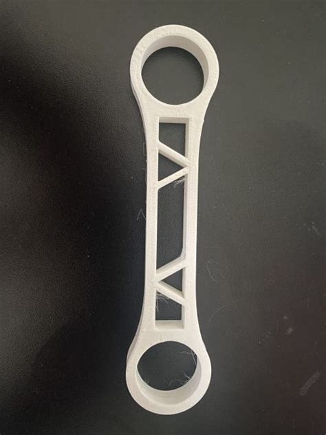 Topology Optimization Of A Helicopter Component Using Metal Additive