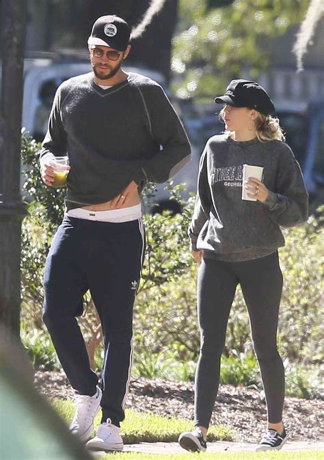 Miley Cyrus And Liam Hemsworth Wear Wedding Bands On Ring Finger