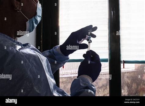 The Nurse Prepares Another Dose Each Container Of The Pfizer Vaccine