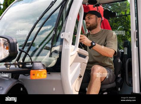 Man Worker Is Operating The Agri Farmer Rotating Telescopic Handler