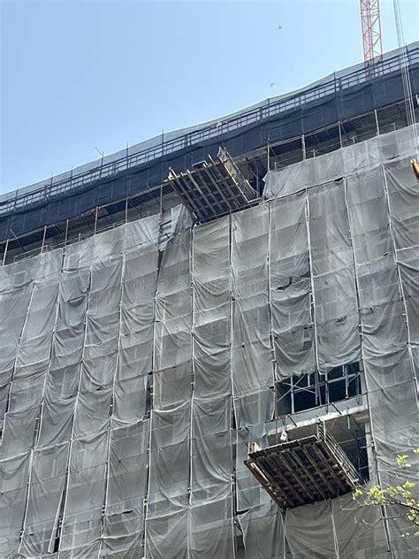 Building Under Construction With Scaffolding And Crane In The City Stock Image Image Of