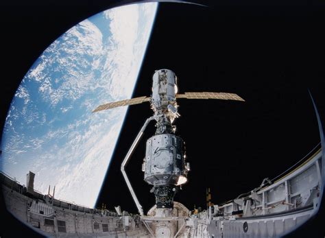 A space station is born. The Russian Zarya module (top) is connected to the US Unity node using ...