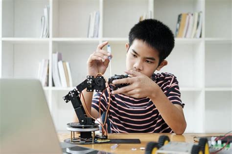 Student Doing Robot Project In Science Technology Of Robotics