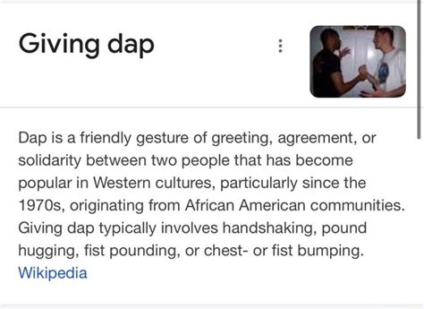 Giving Dap Dap Is A Friendly Gesture Of Greeting Agreement Or Solidarity Between Two People