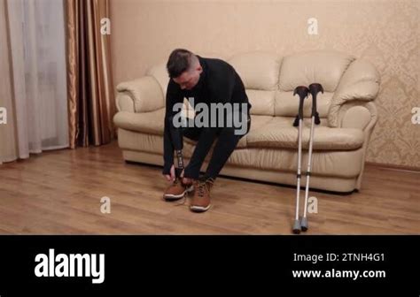 Disabled Man Prosthetic Technology Leg Amputation With His Crutches