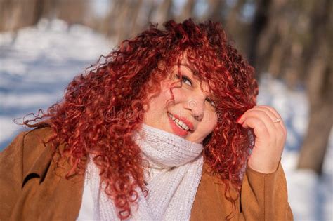Portrait Of A Smiling Chubby Red Haired Woman On A Walk In Winter Stock Photo Image Of Freeze