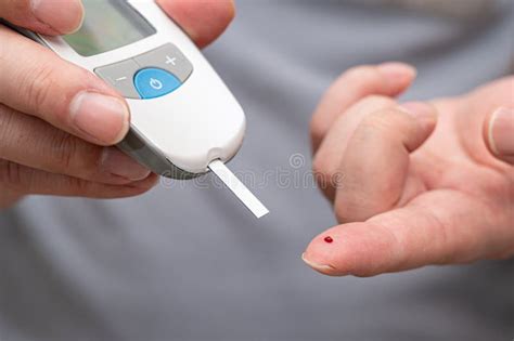 Man Measures His Blood Sugar Glucometer Blood Sample Test Diabetes