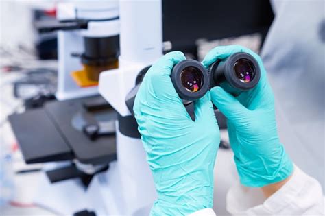 Premium Photo Close Up Of Binoculars Of Microscope Focused On A Specimen
