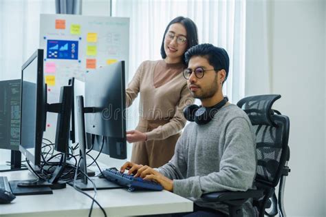 Asian And Indian Developer Team Discussion Feedback Analysis Coding