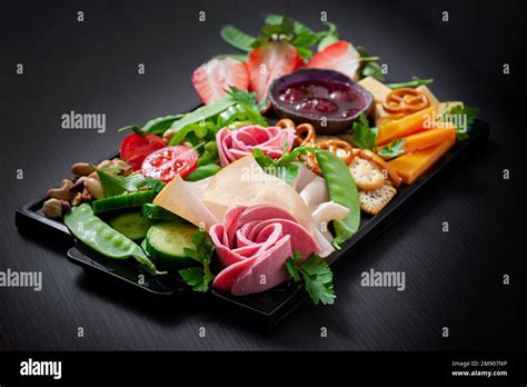 Antipasto Platter Cold Sliced Ham Salami Crackers Strawberries