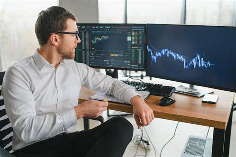 Premium Photo Serious Business Man Trader Analyst Looking At Computer